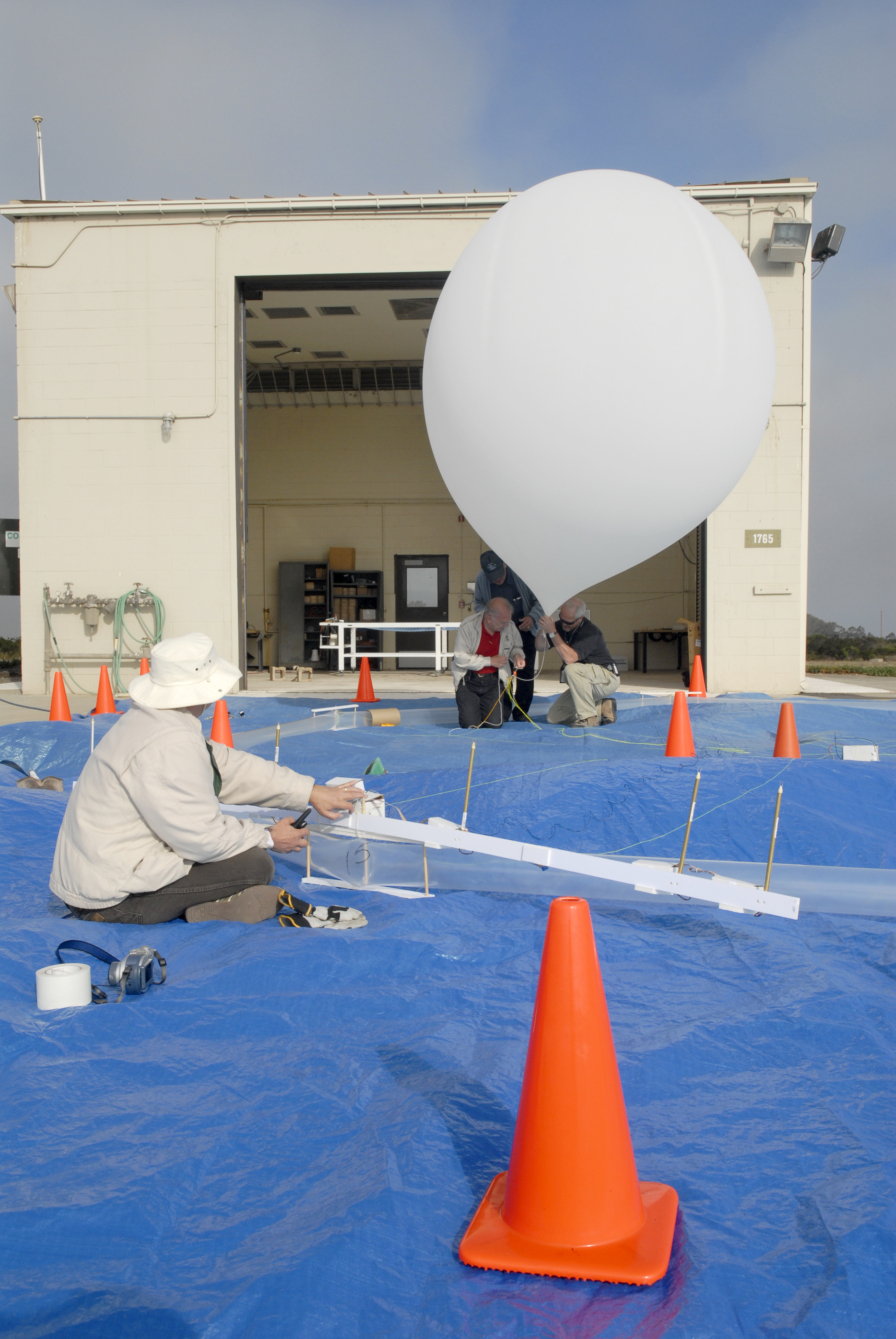 Airborne laser balloon launched
