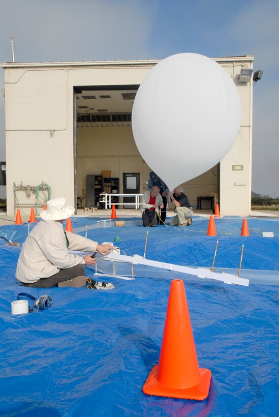 Airborne laser balloon launched