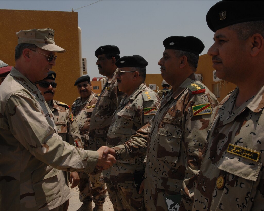 An Iraqi band plays during the arrival of U.S. Navy Admiral Edmund P ...