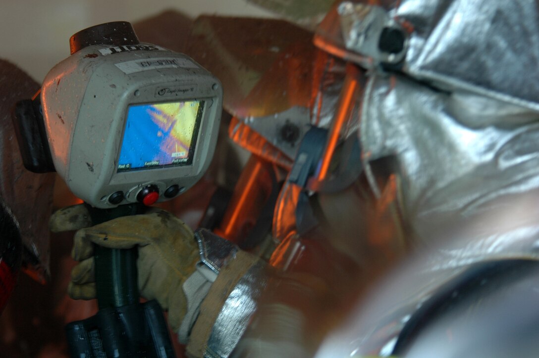 Air Force firefighters fuel flames for live fire training