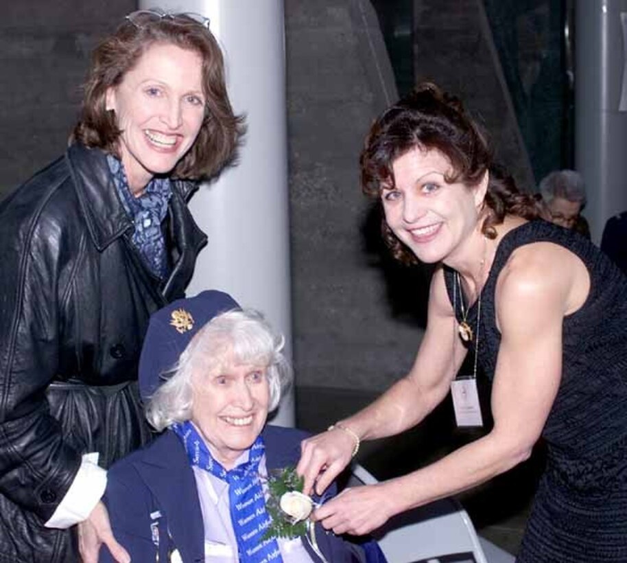 Deborah Darr (left) and Alice Carron (right) laugh it up after pinning ...