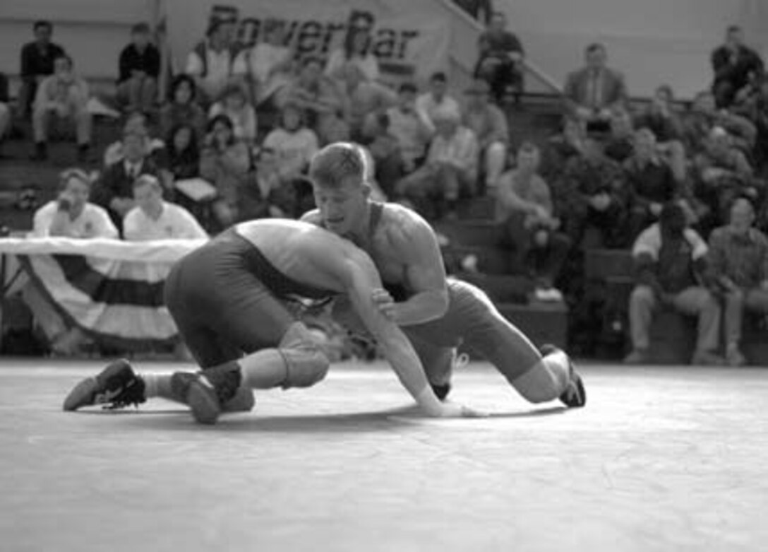 Marine Corps 1st Lt. Jay Antonelli maneuvers for points in his first ...