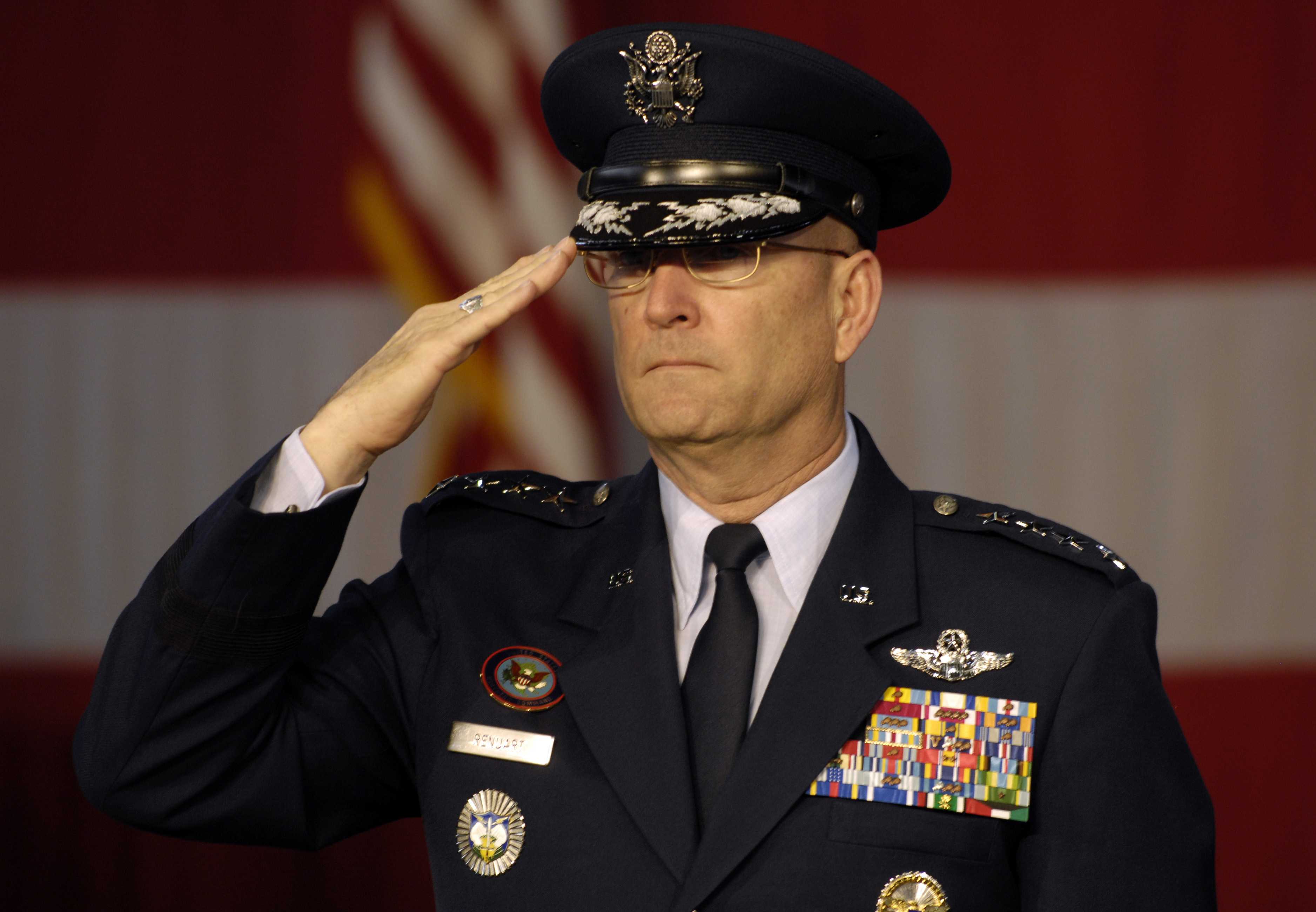 U.S. Air Force Gen. Victor E. Renuart, Jr. salutes during the ...