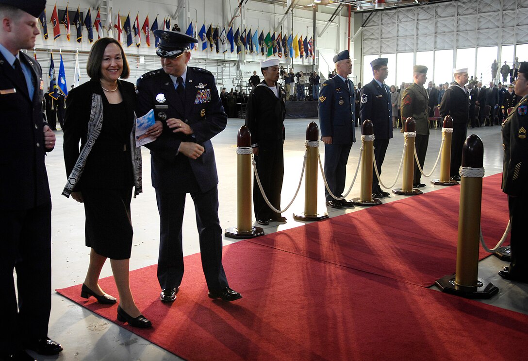 U.S. Air Force Gen. Victor E. Renuart, Jr. departs with his wife Jill following the U.S ...