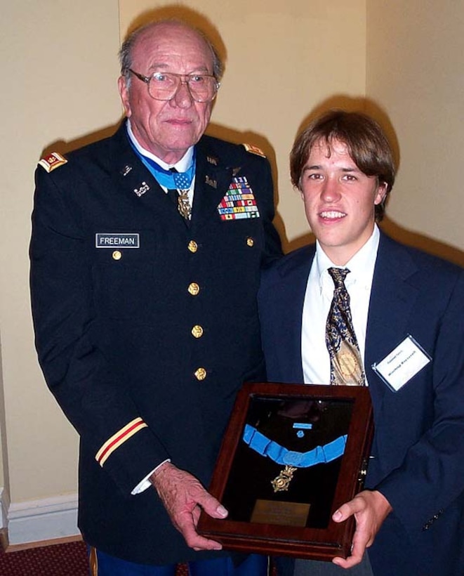 Retired Army Maj. Ed W. Freeman poses with Winthrop Roosevelt, who ...
