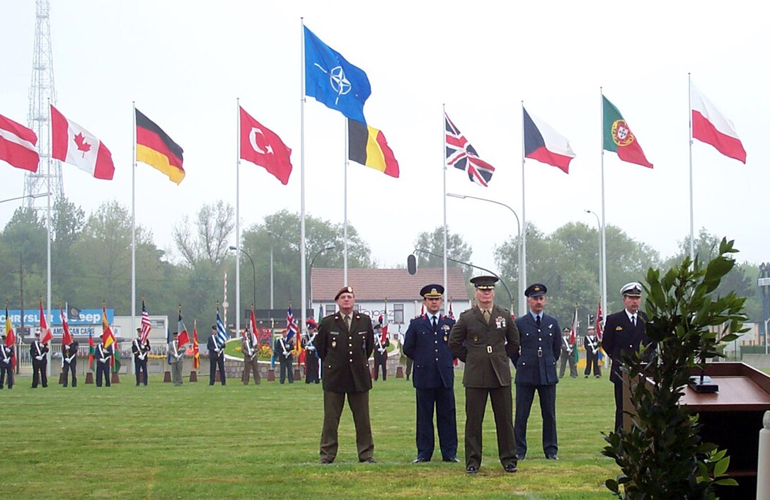 With national flags flying overhead, NATO troops honor U.S. Army Gen ...