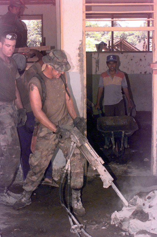 Combat engineer Lance Cpl. Eric Charleboisof Landing Force Cooperation ...