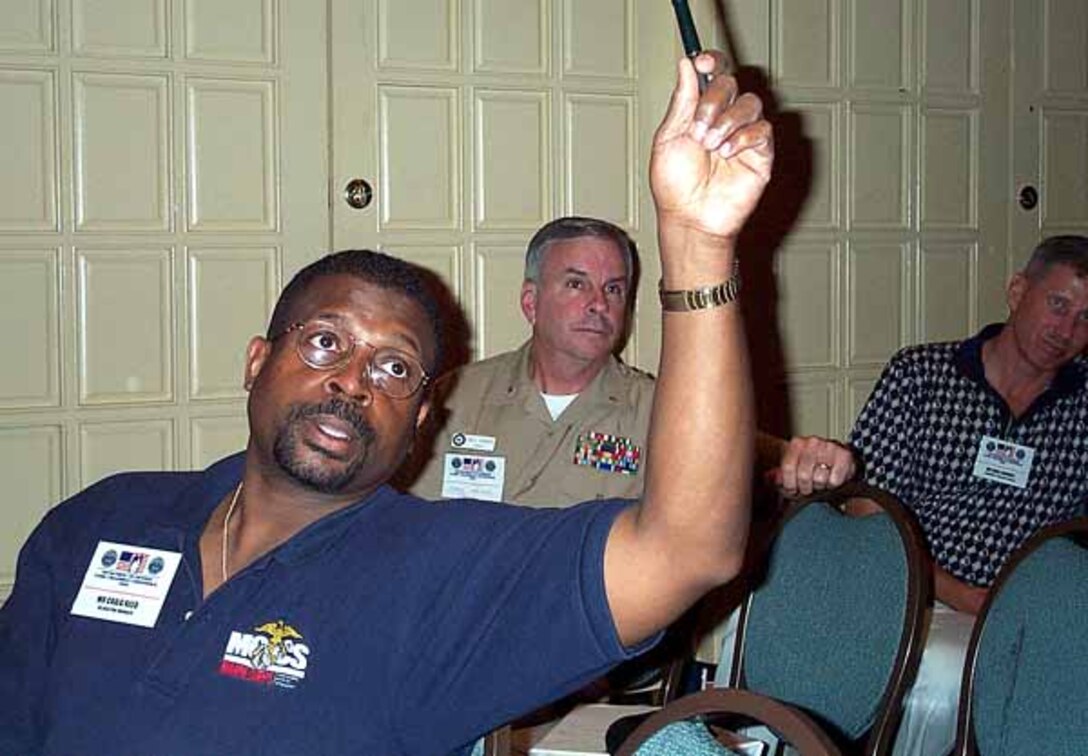Craig Reed (left front), relocation manager, Marine Corps Command and ...