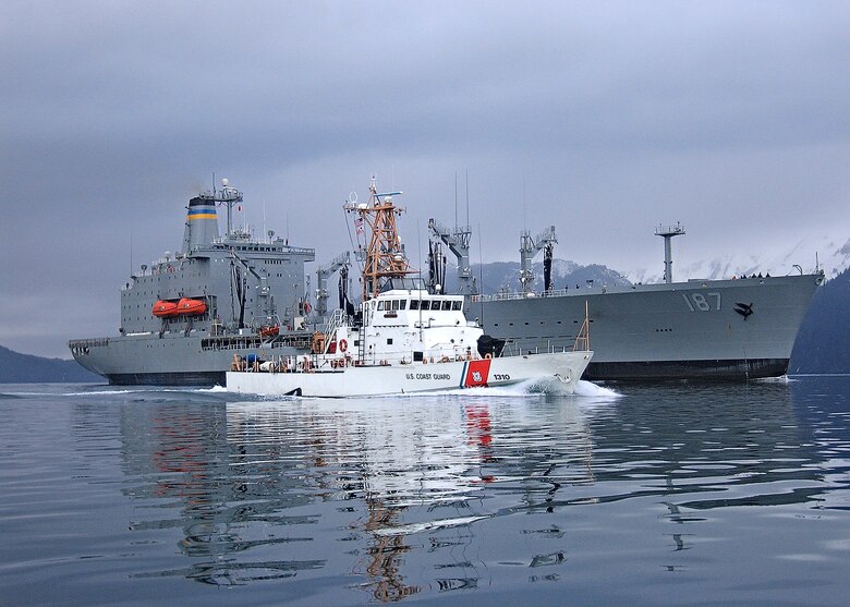 The Coast Guard Cutter Mustang escorts the United States Navy Ship ...