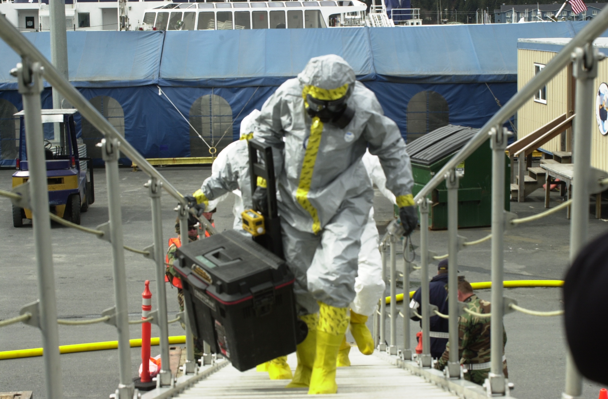 Members of the National Guard Civil Support Team board the USNS Kaiser ...