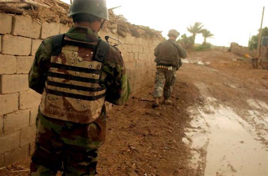 In a joint effort to find three missing soldiers, an Iraqi Army soldier ...
