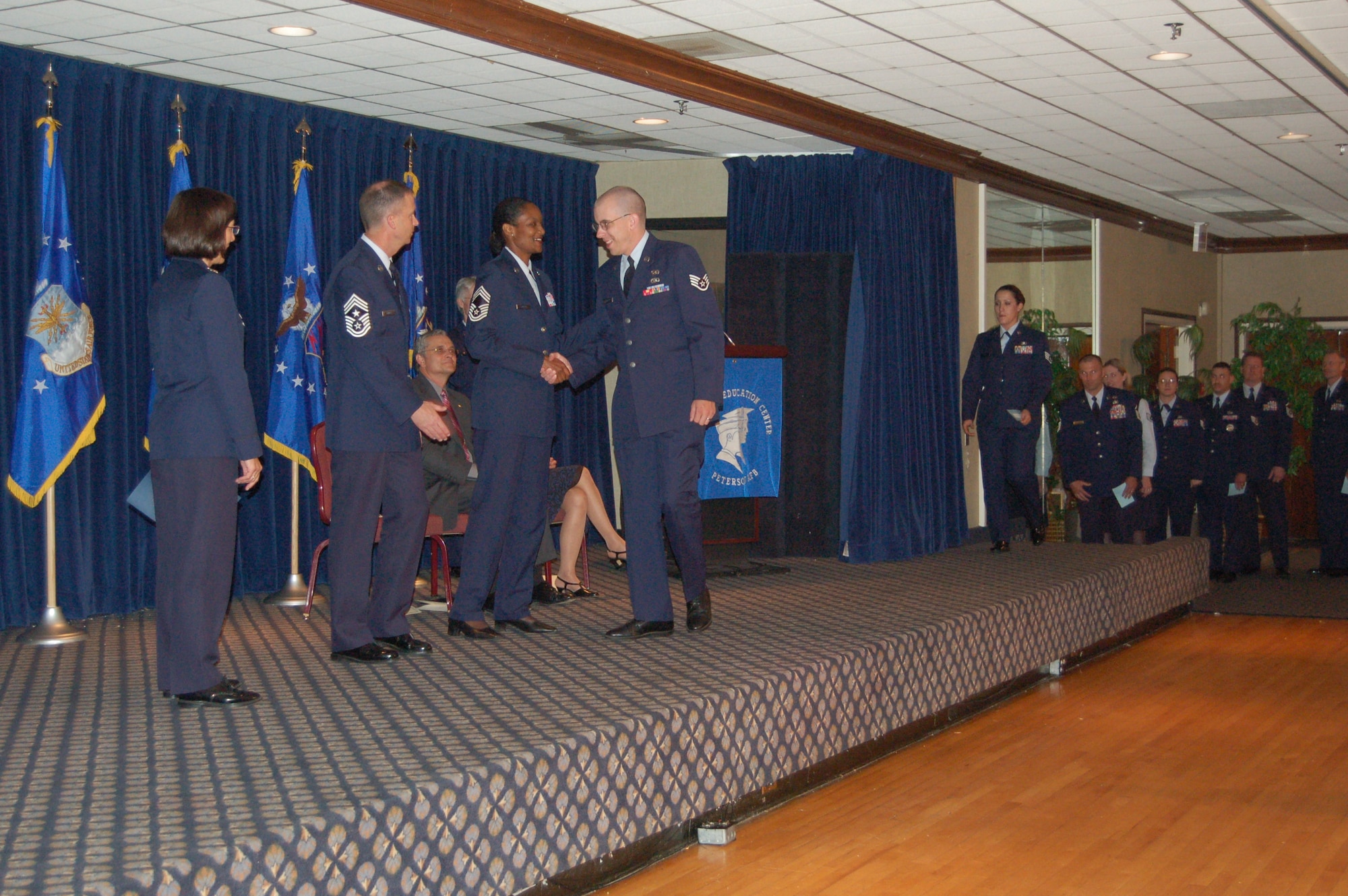Community College of the Air Force honors graduates > Peterson and ...
