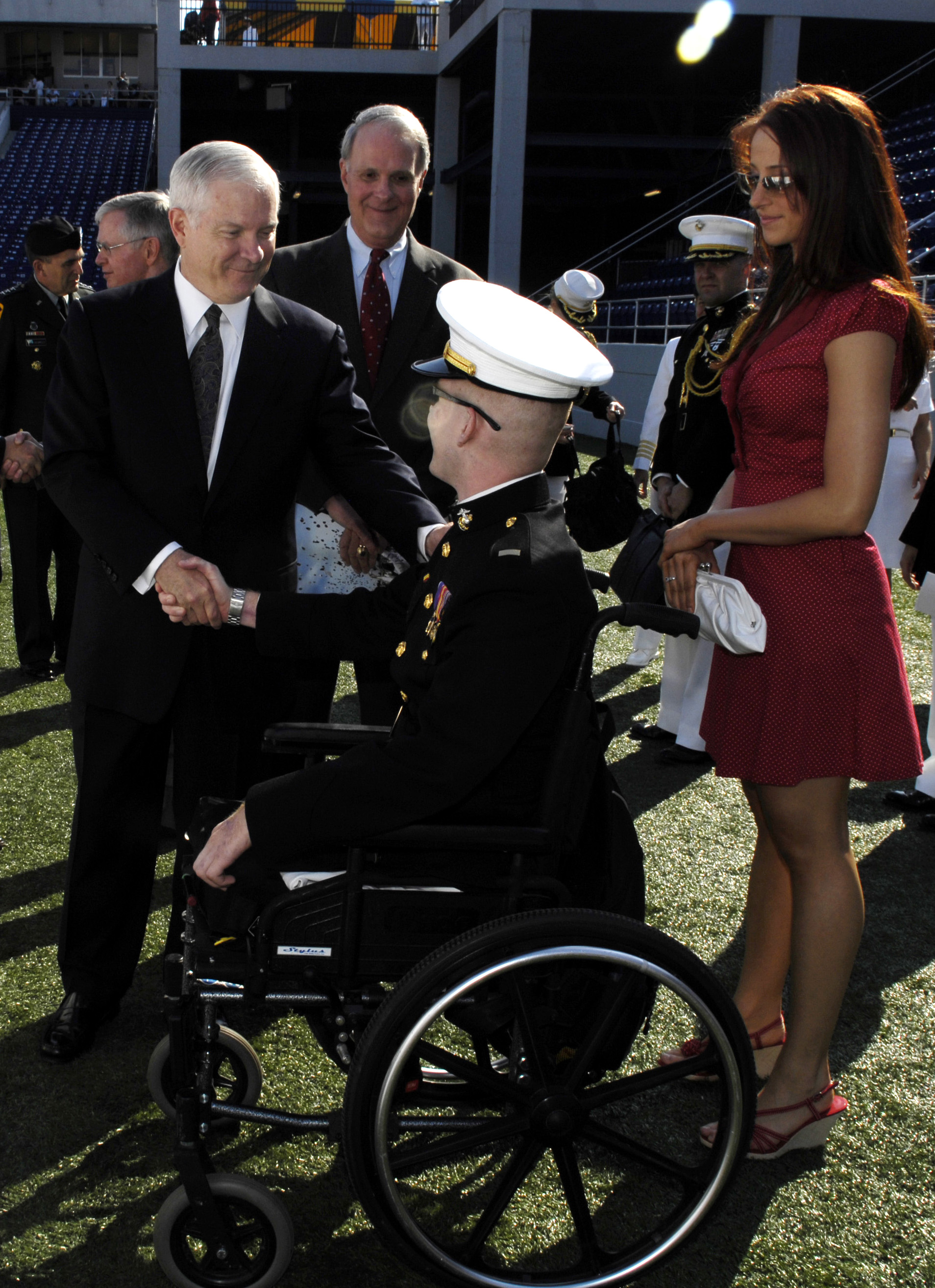 Secretary of Defense Robert M. Gates shakes hands with U.S. Marine 1st ...