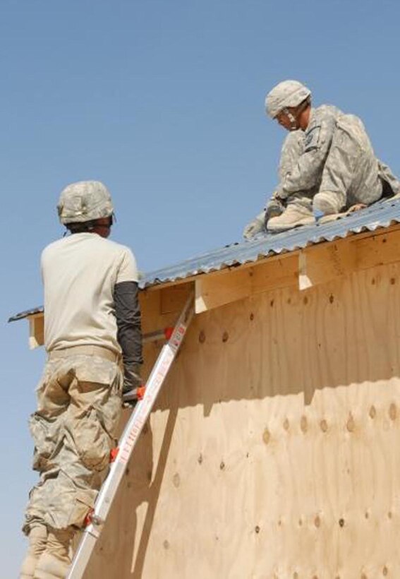 Soldiers of Alpha Company, 864th Engineer Battalion, from Fort Lewis ...