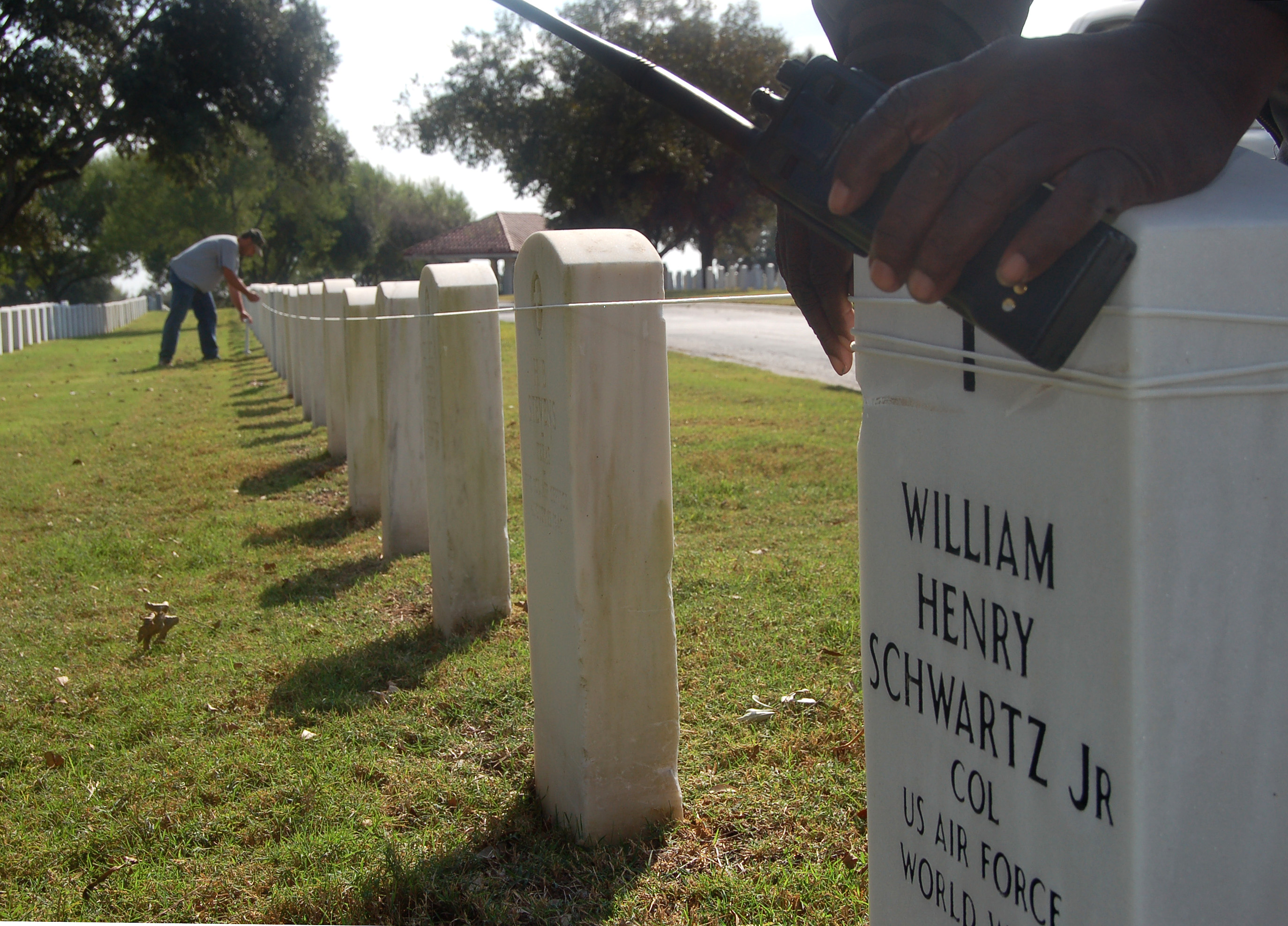 Airmen show respect to fallen servicemembers through community service ...