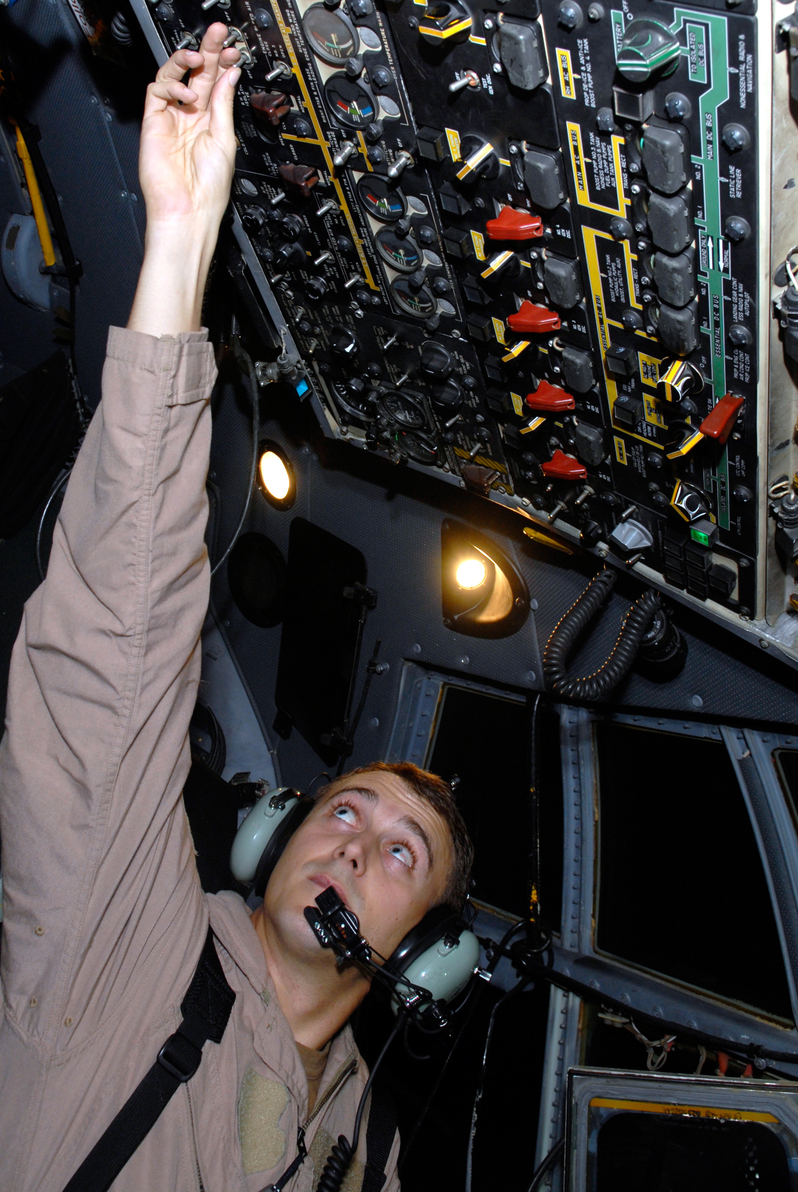 U.S. Air Force Tech. Sgt. James Brady inspects instrument settings in ...
