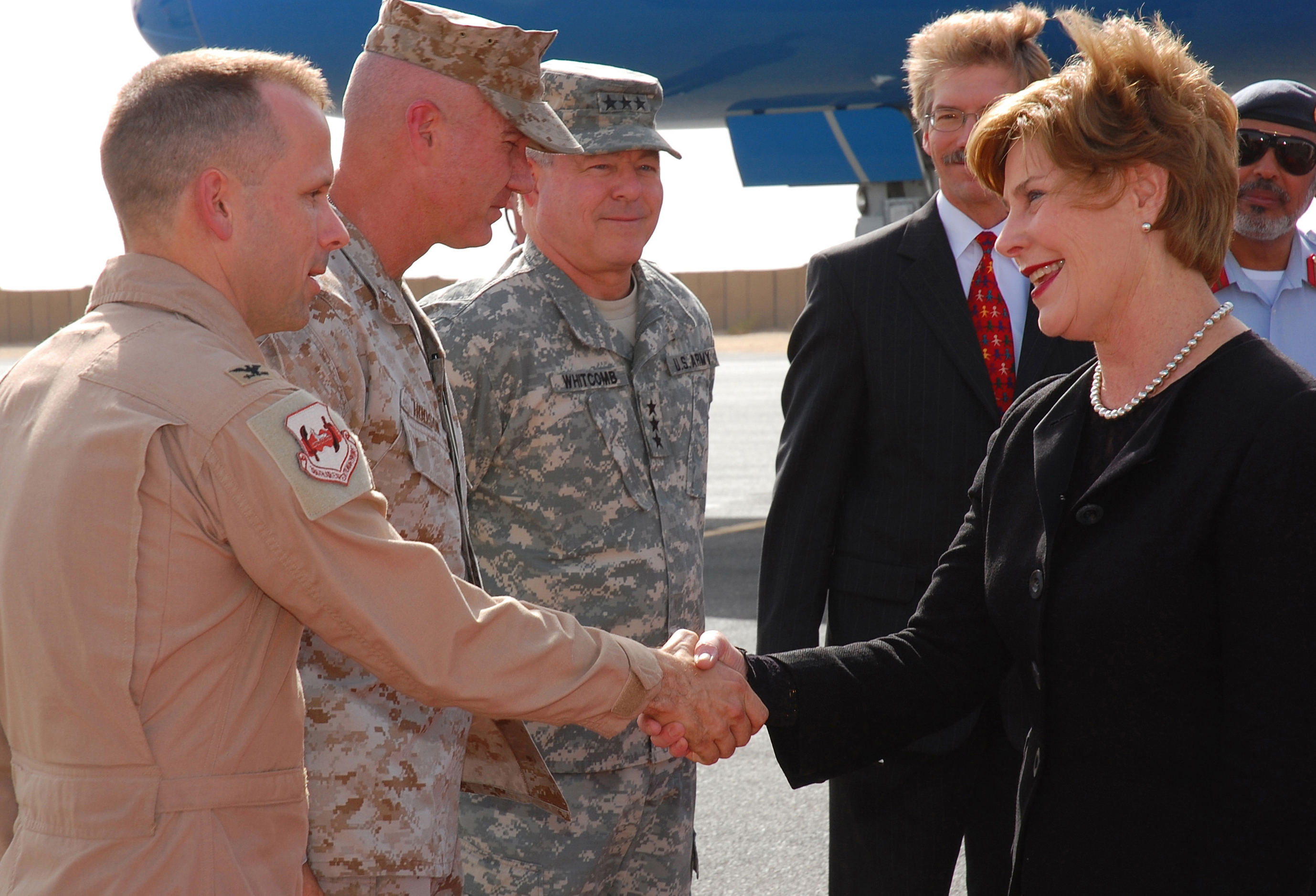 First lady Laura Bush greets U.S. Air Force Col. Brian O'Connor, vice ...