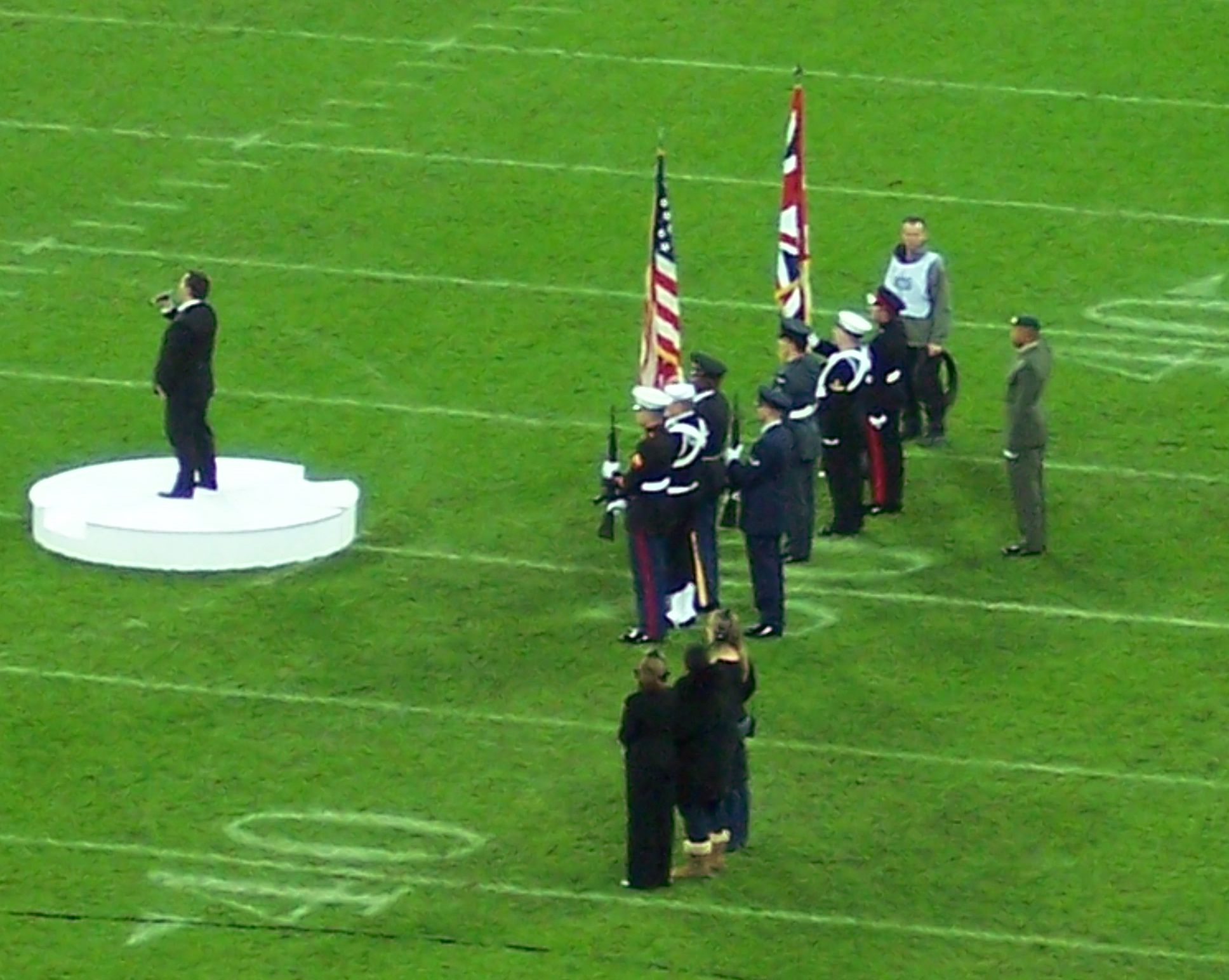 US & UK color guards stand at attention as "God Save The Queen" is played