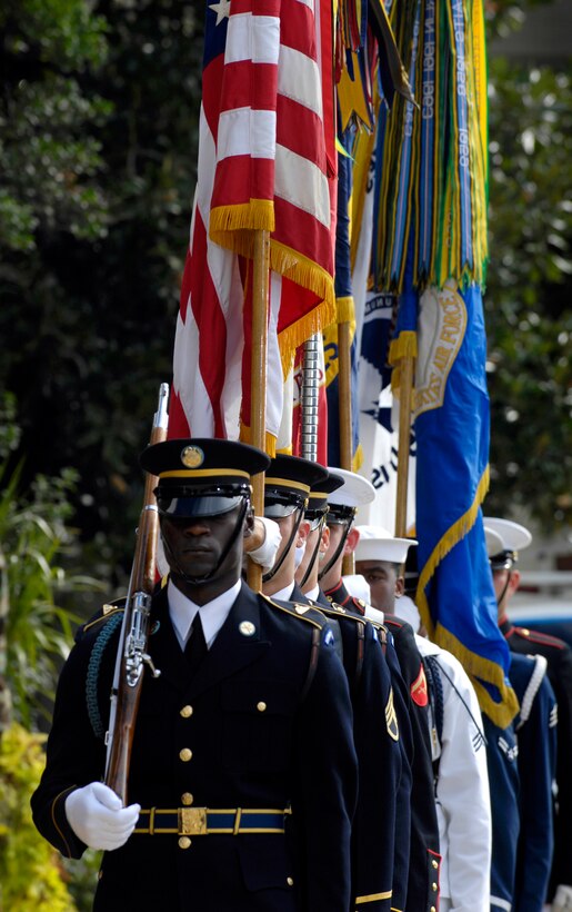 A joint color guard posts the colors during an enlisted call with ...