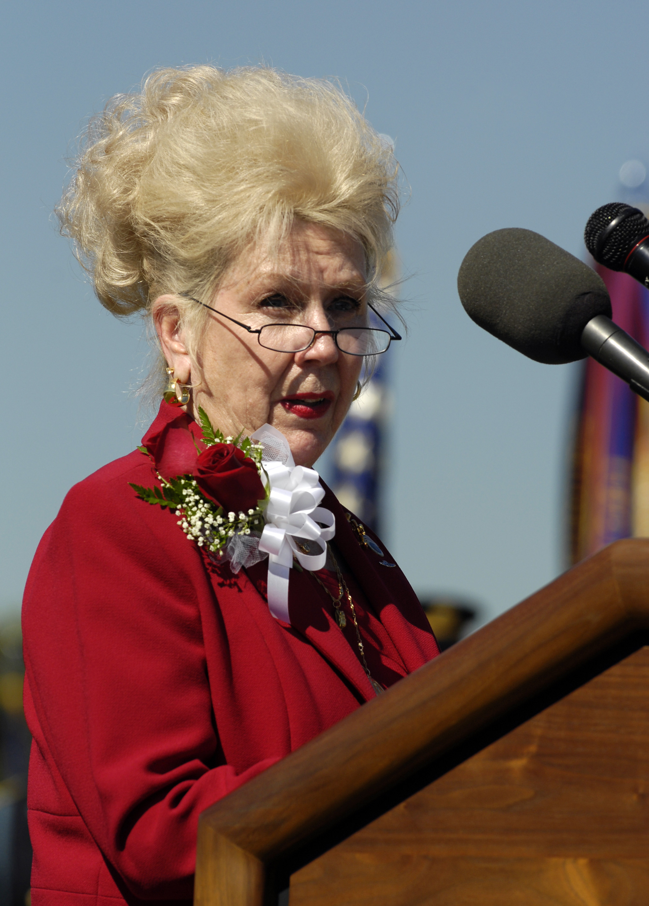 Patricia Scharf, widow of Air Force Col. Charles Scharf, addresses the ...