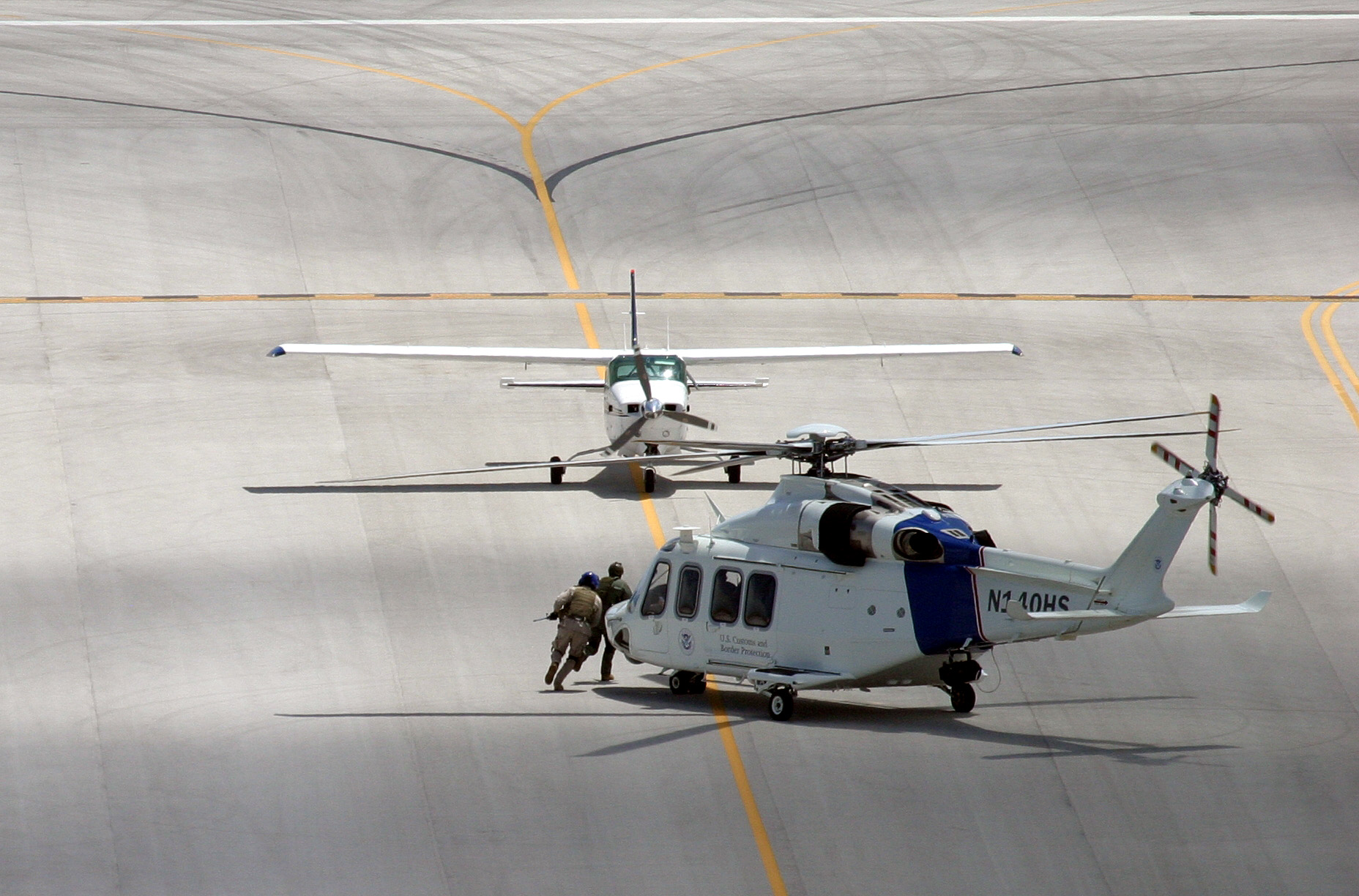 Customs and Border Protection agents test and evaluate new helo