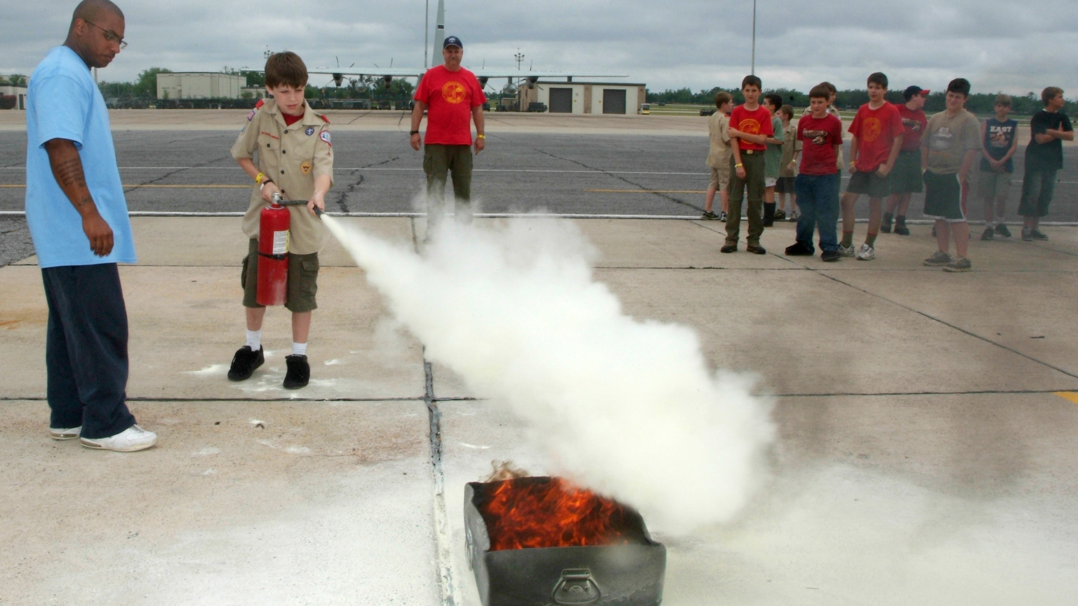 Deluge doesn’t dampen spirit of Boy Scouts, base volunteers