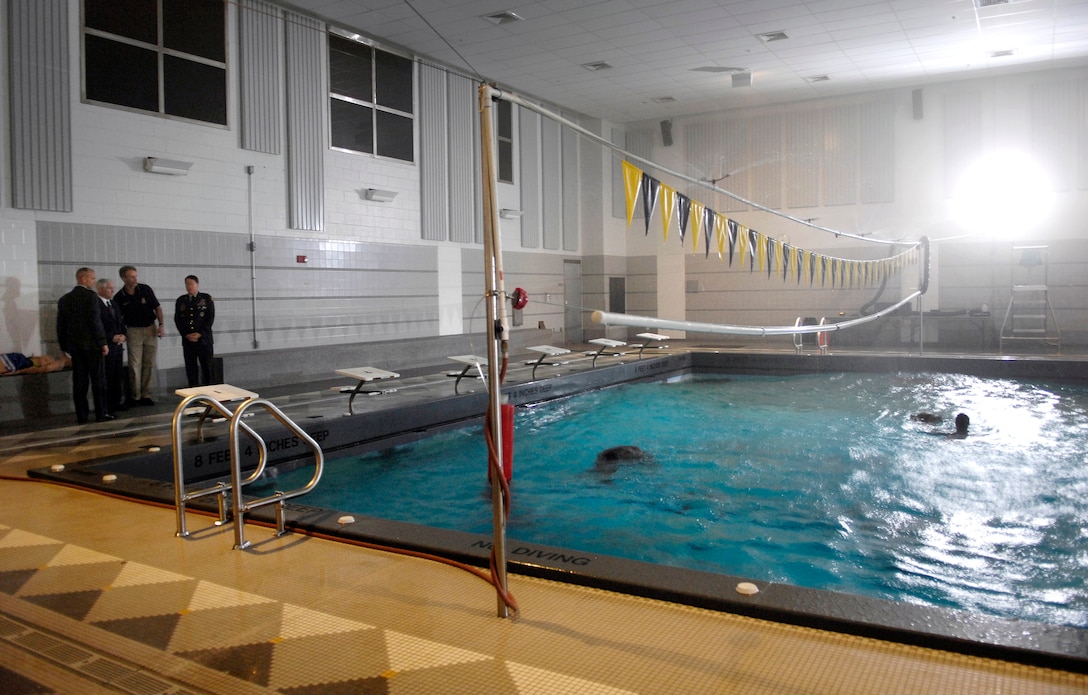 Defense Secretary Robert M. Gates observes a survival swimming class at ...