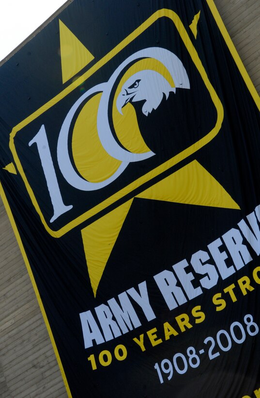 A banner marking the 100th anniversary of the U.S. Army Reserve hangs ...