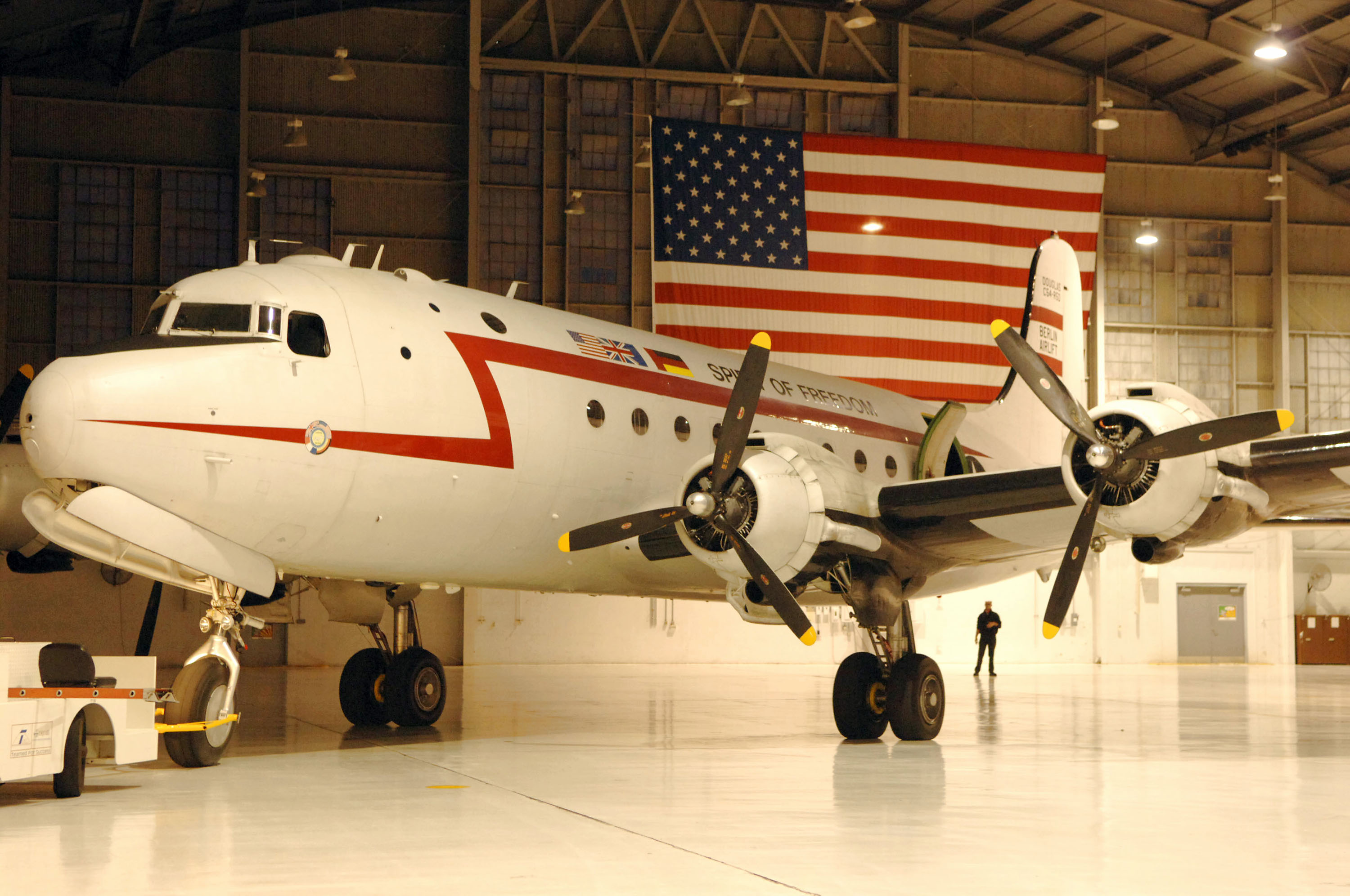 The C-54 Skymaster "Spirit of Freedom" gets backed into a hangar March ...