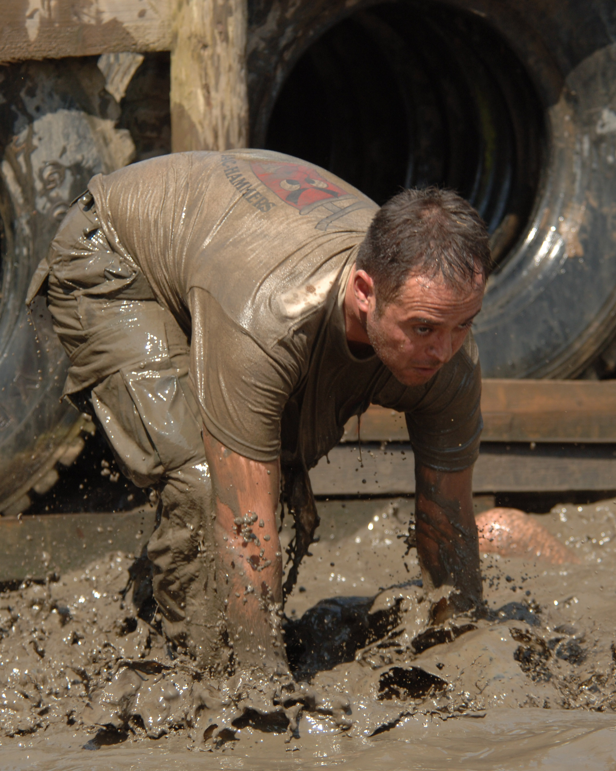 Lieutenant José Lepesuastegui, comes up muddy for his team
