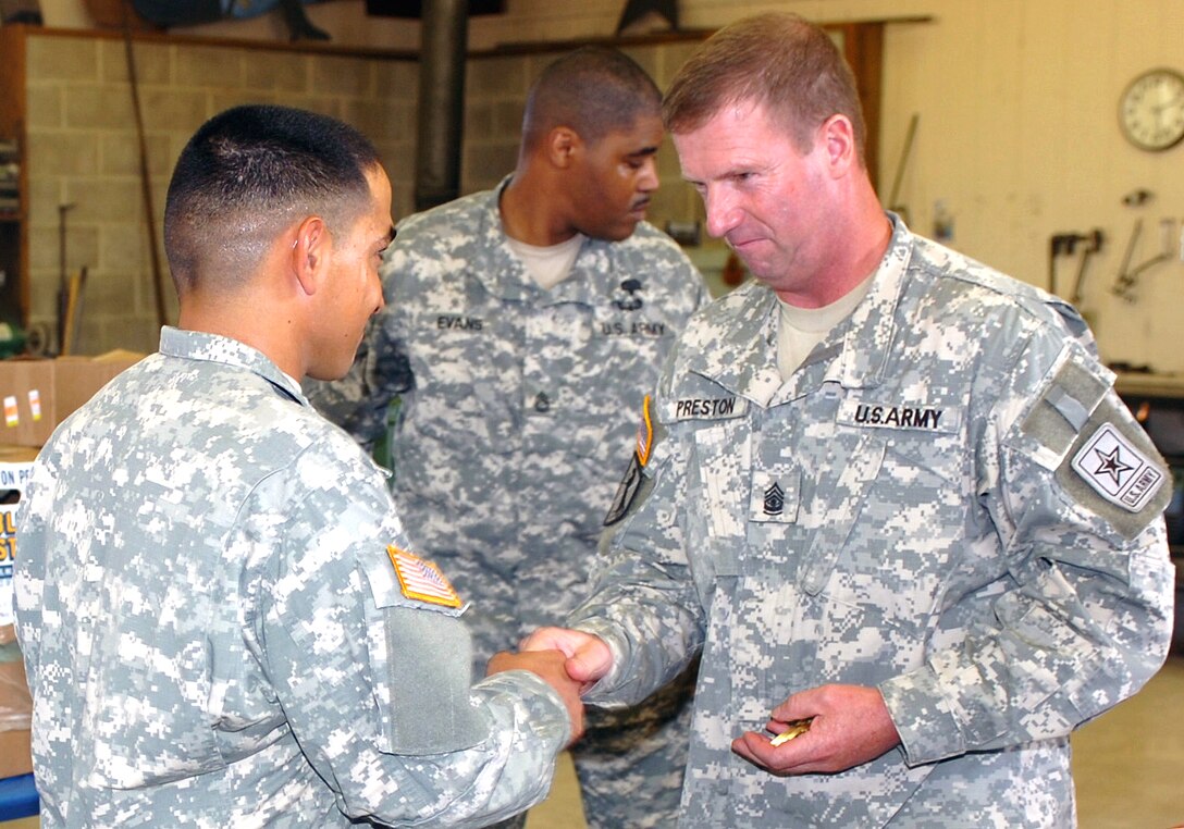 Sgt. Maj. of the Army, SMA, Kenneth O. Preston, right, takes the ...