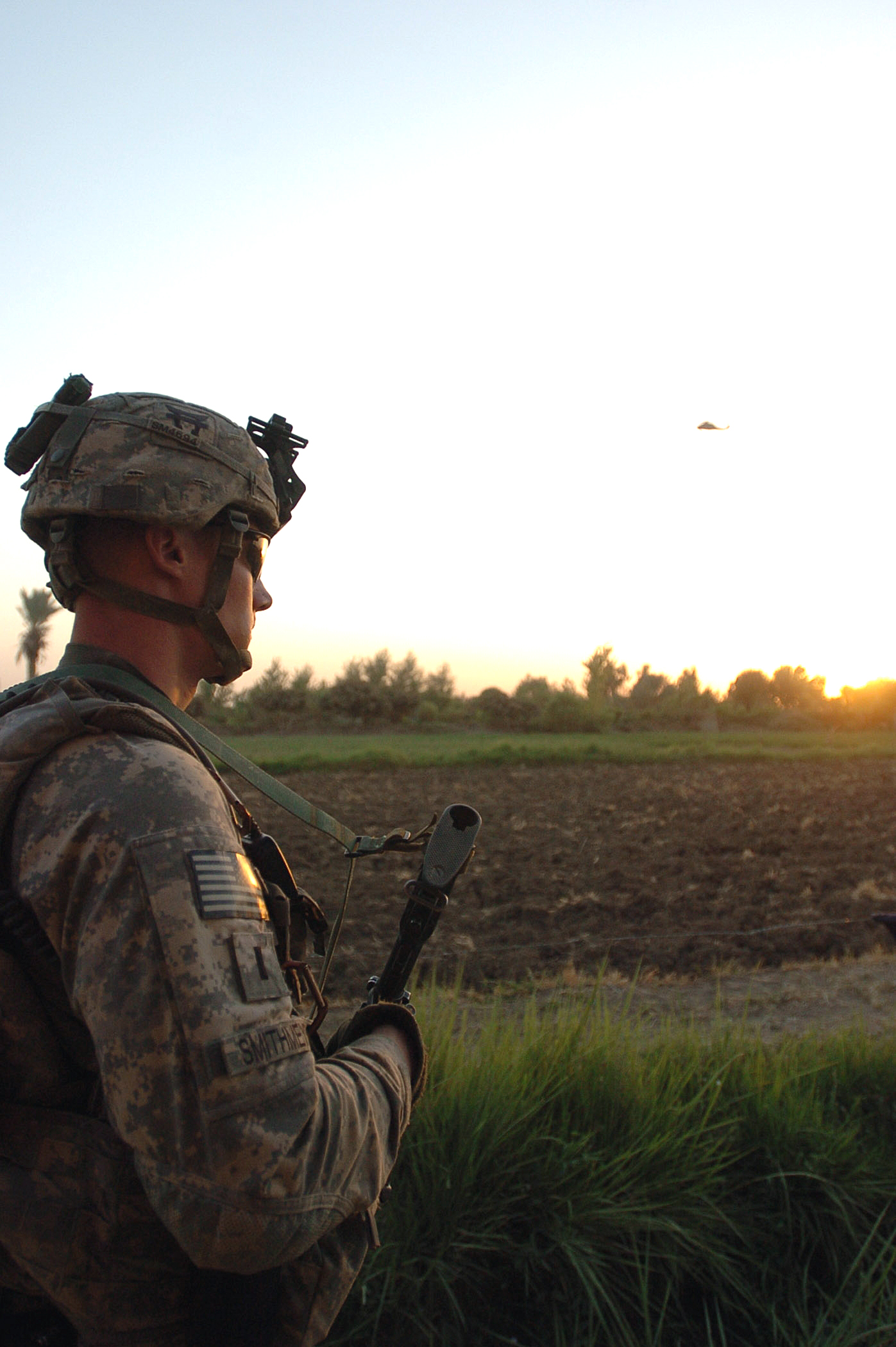 U.S. Army 1st Lt. Colby Smithmeyer overlooks the drop-off point as a UH ...