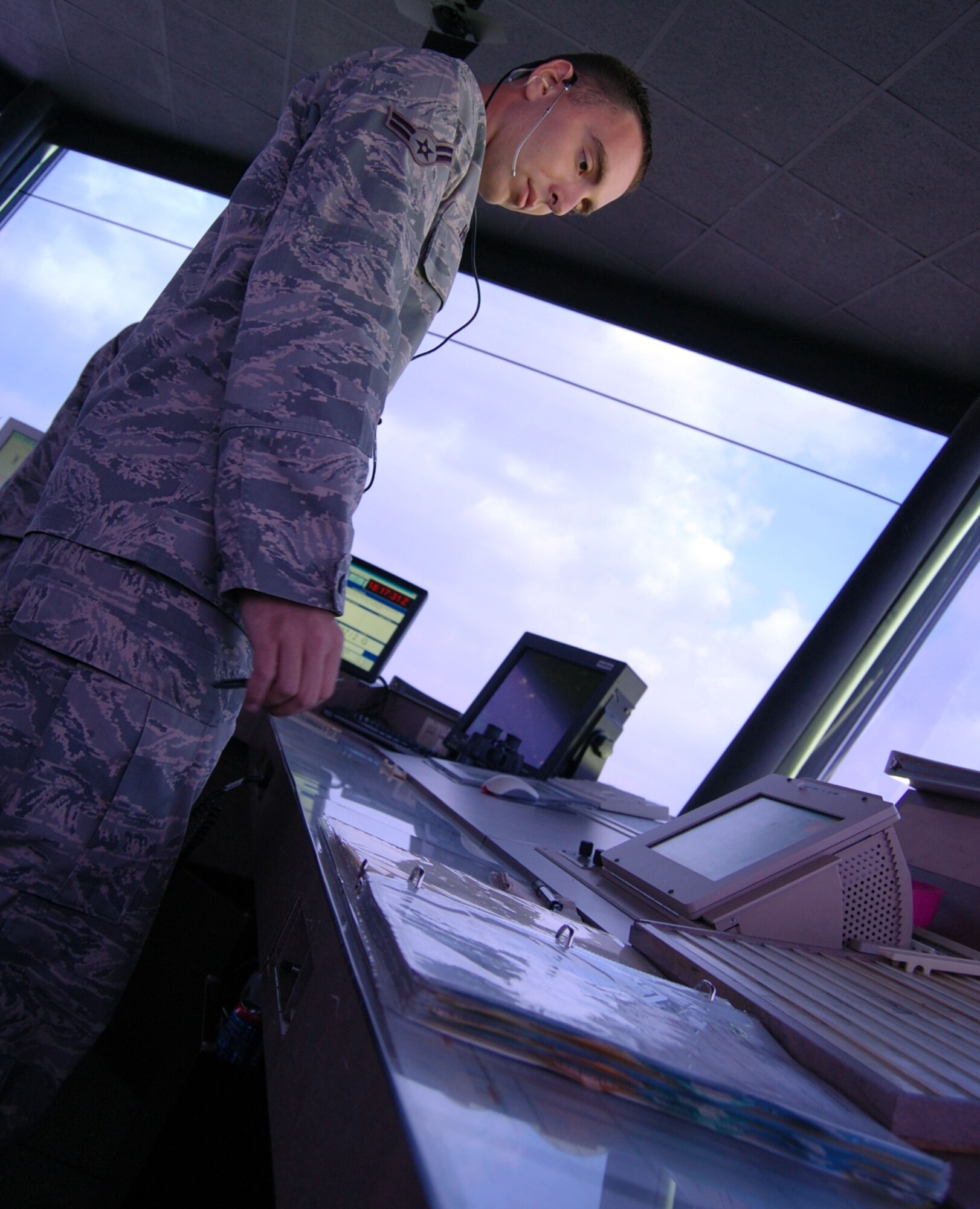 PHOTO OF THE WEEK: Airman 1st Class Michael Homans helpd keeps pilots safe in the ATC tower ...