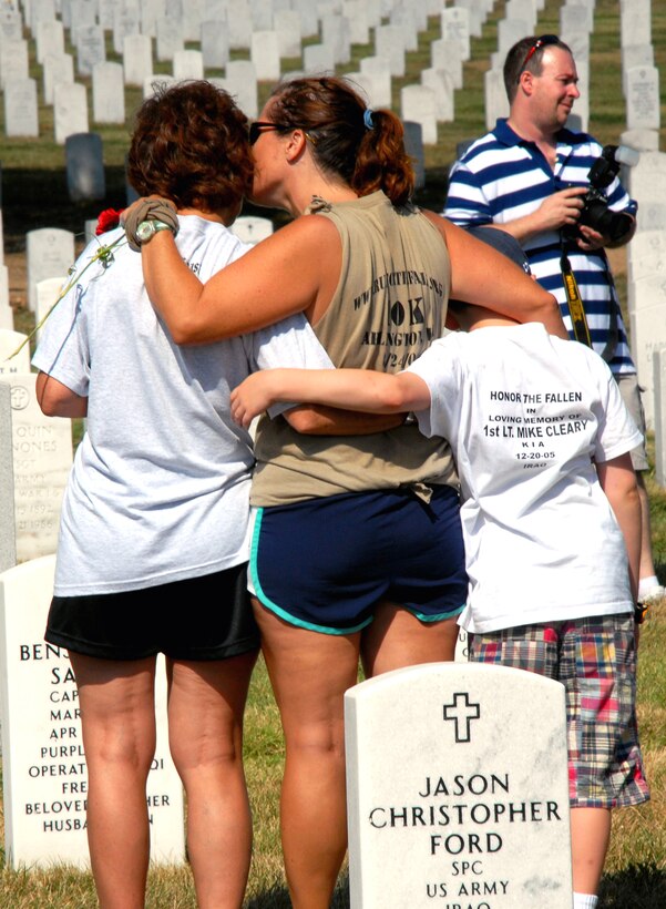 Shannon Cleary, center, kisses her mother, Marianne Cleary, Aug. 24 ...