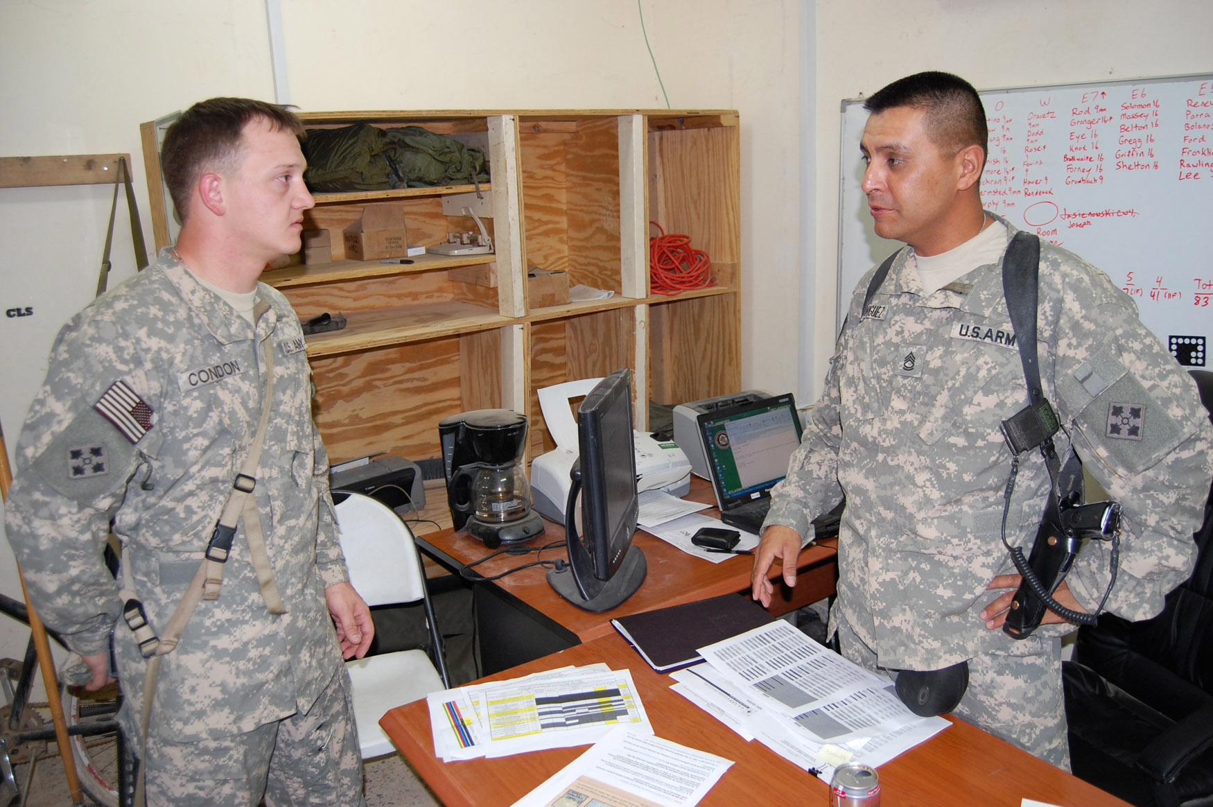 Army Cpl. Jack Condon briefs Army Sgt. 1st Class Albert Rodriguez on ...