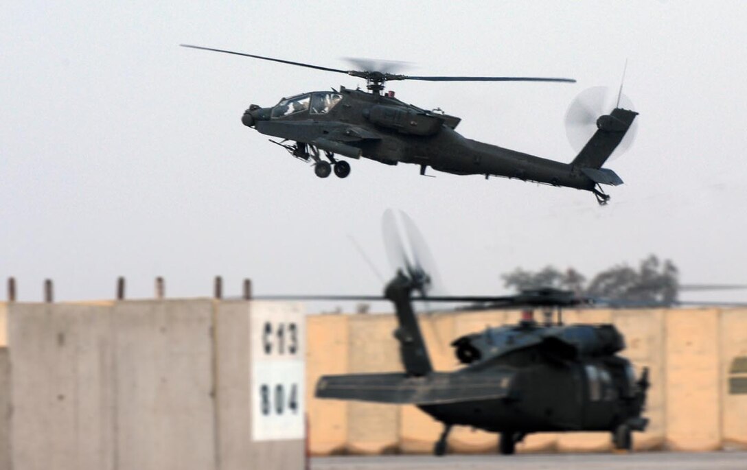 An AH-64D Apache takes off from Camp Taji, Iraq. Pilots with 4th ...