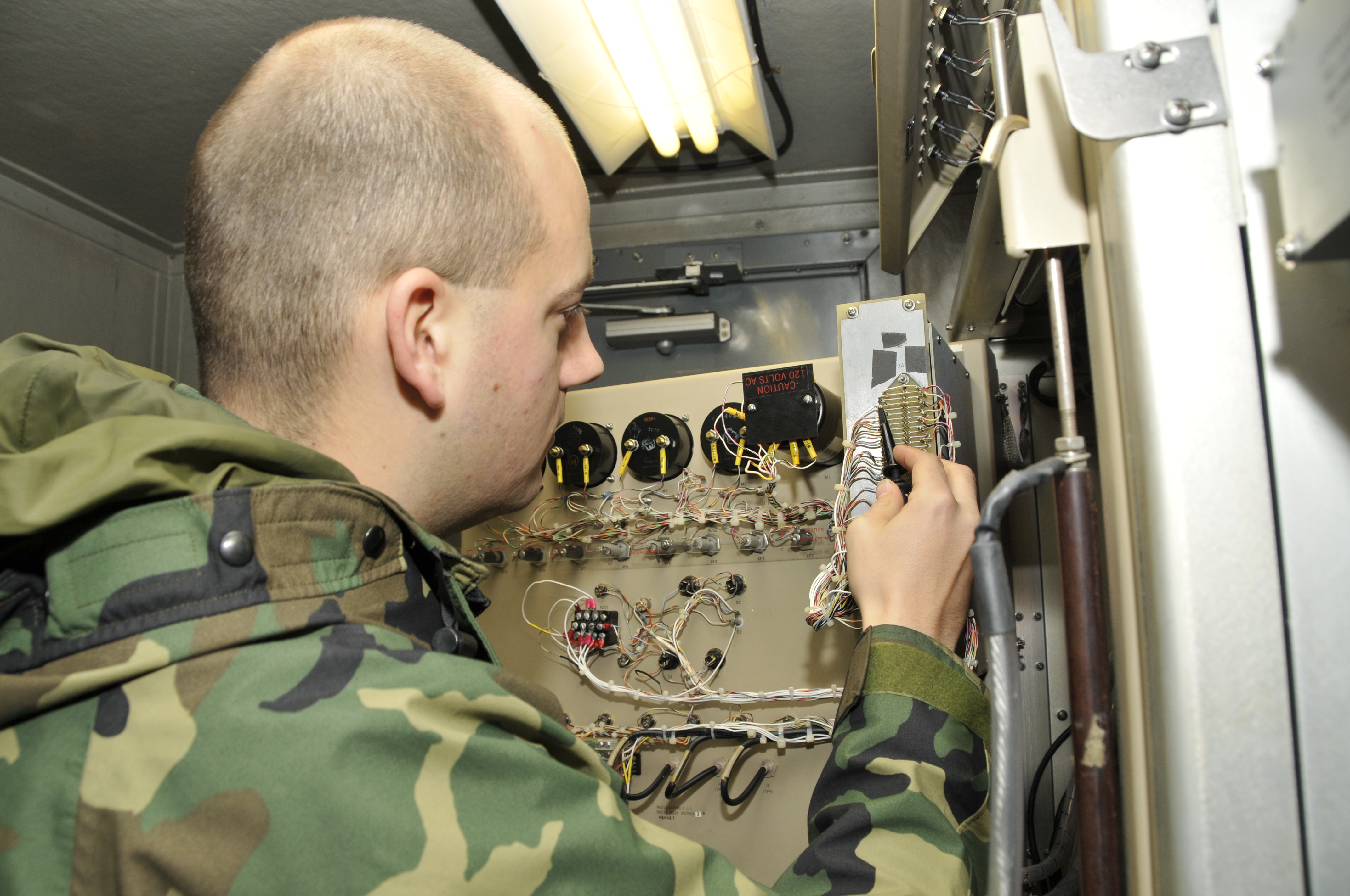 Ground radar systems personnel are on the job