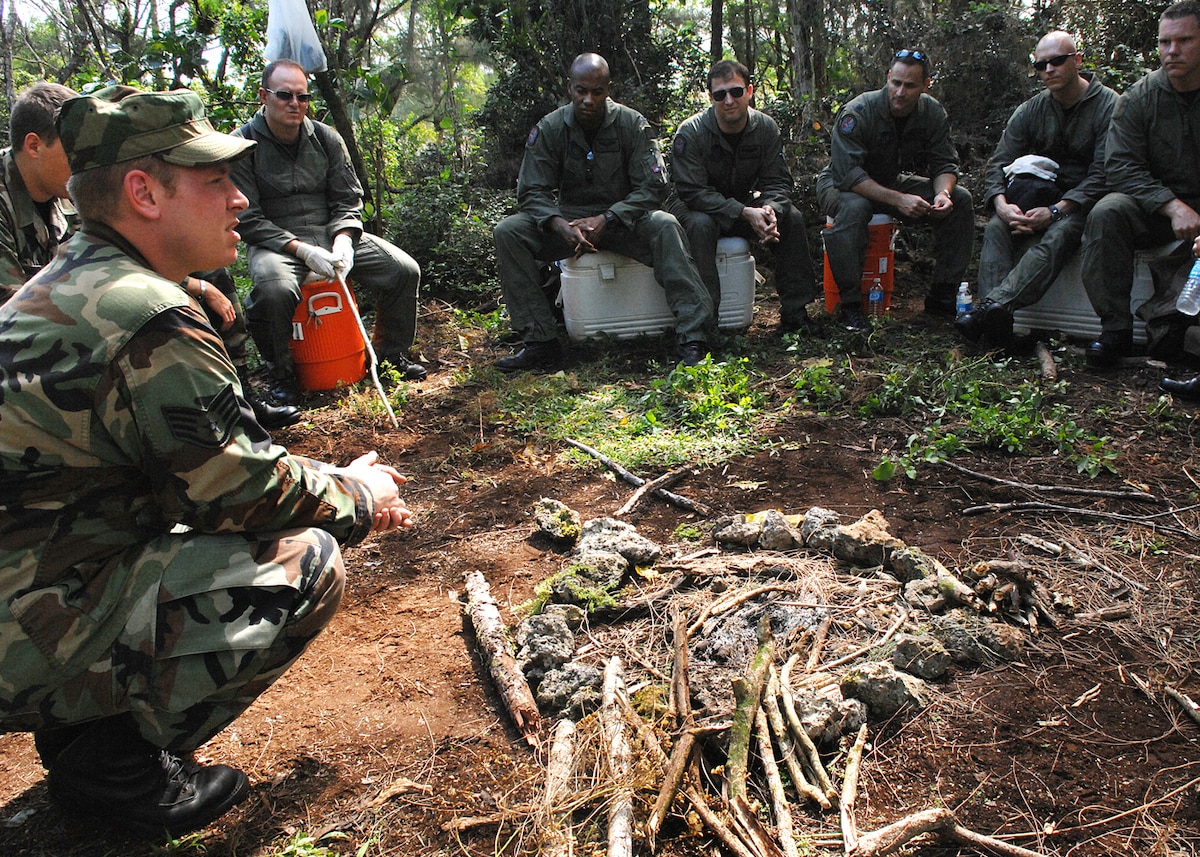 Deployed bomber personnel participate in joint SERE training exercise ...