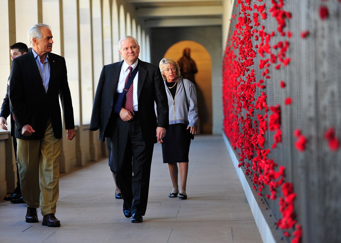 U.S. Defense Robert M. Gates and Australian Maj. Gen. Steve Gower look ...