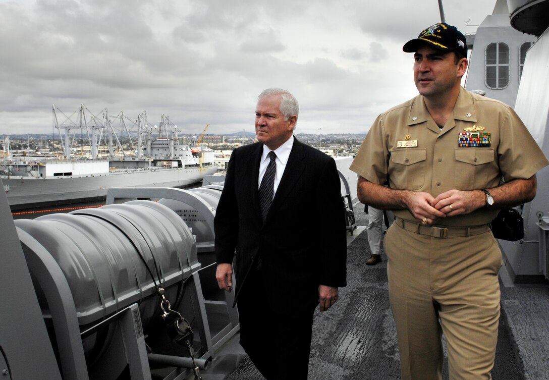 Navy Cmdr. John Skillman, commander of the U.S.S. New Orleans, gives ...