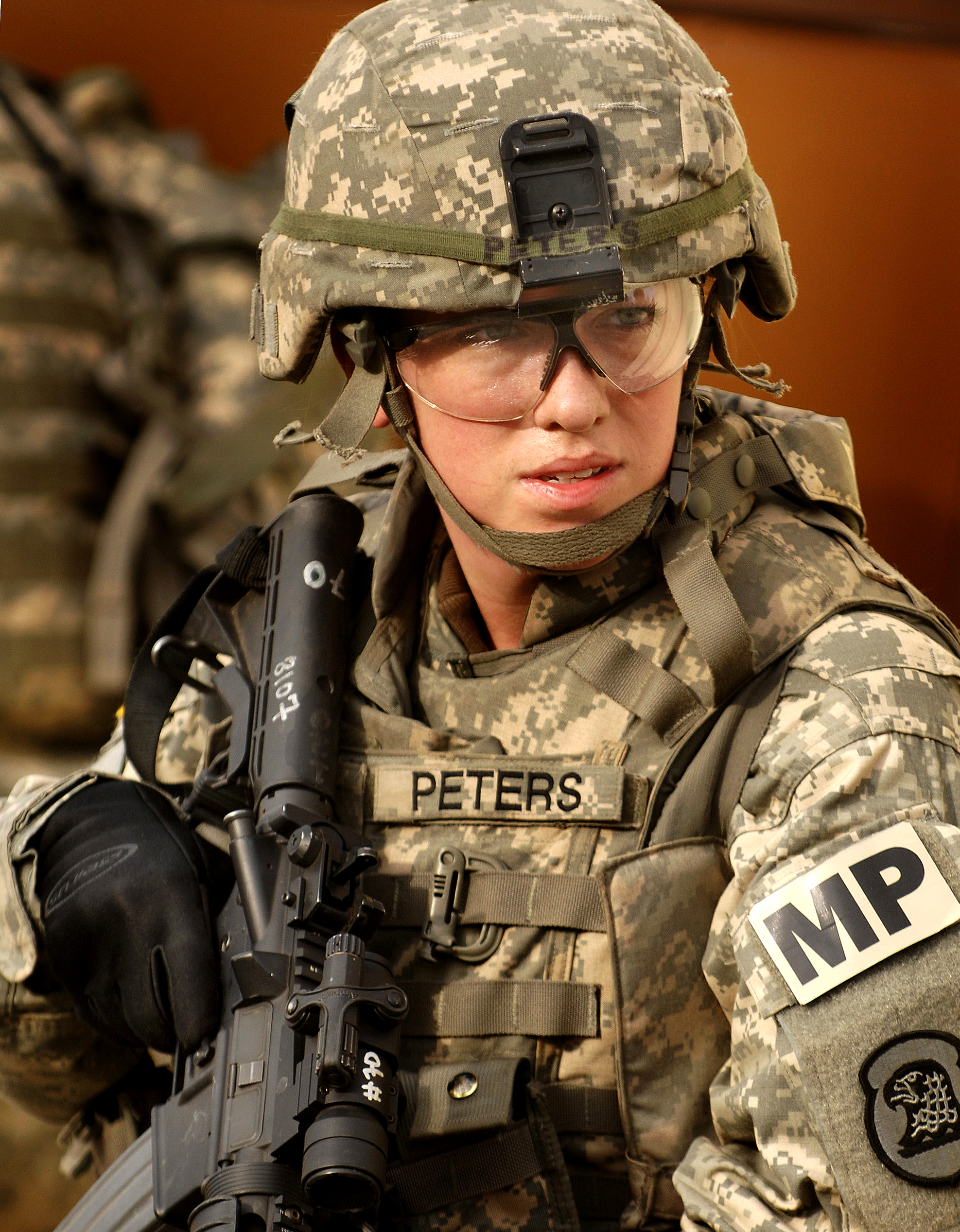 U.S. Army National Guard Sgt. Jennifer Peters stands watch during ...