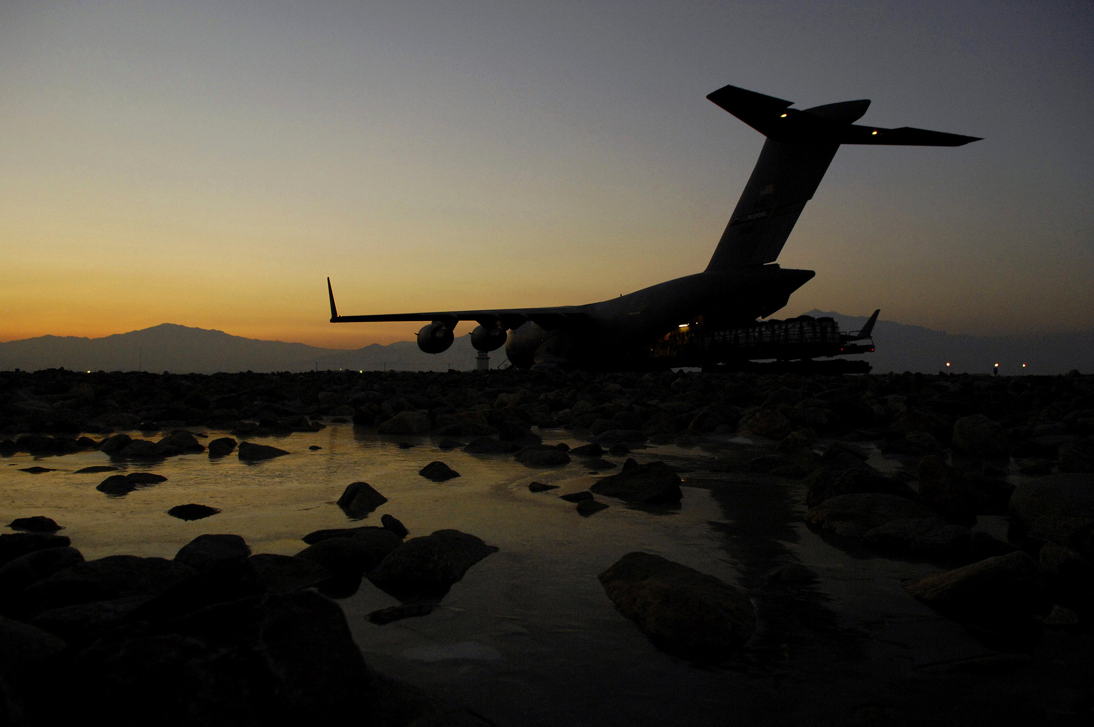 Airmen airdrop 80,000 pounds of food, supplies for Afghans > Air Force ...