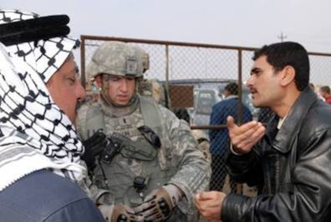 Army 1st Lt. Nick Piergallini, along with Sheik Emad Abdul-Settar ...