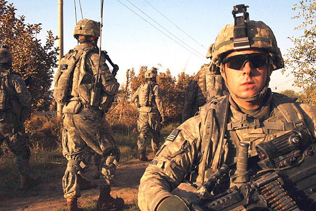 U.S. Army Staff Sgt. Jeremy Johnson provides security during an air ...