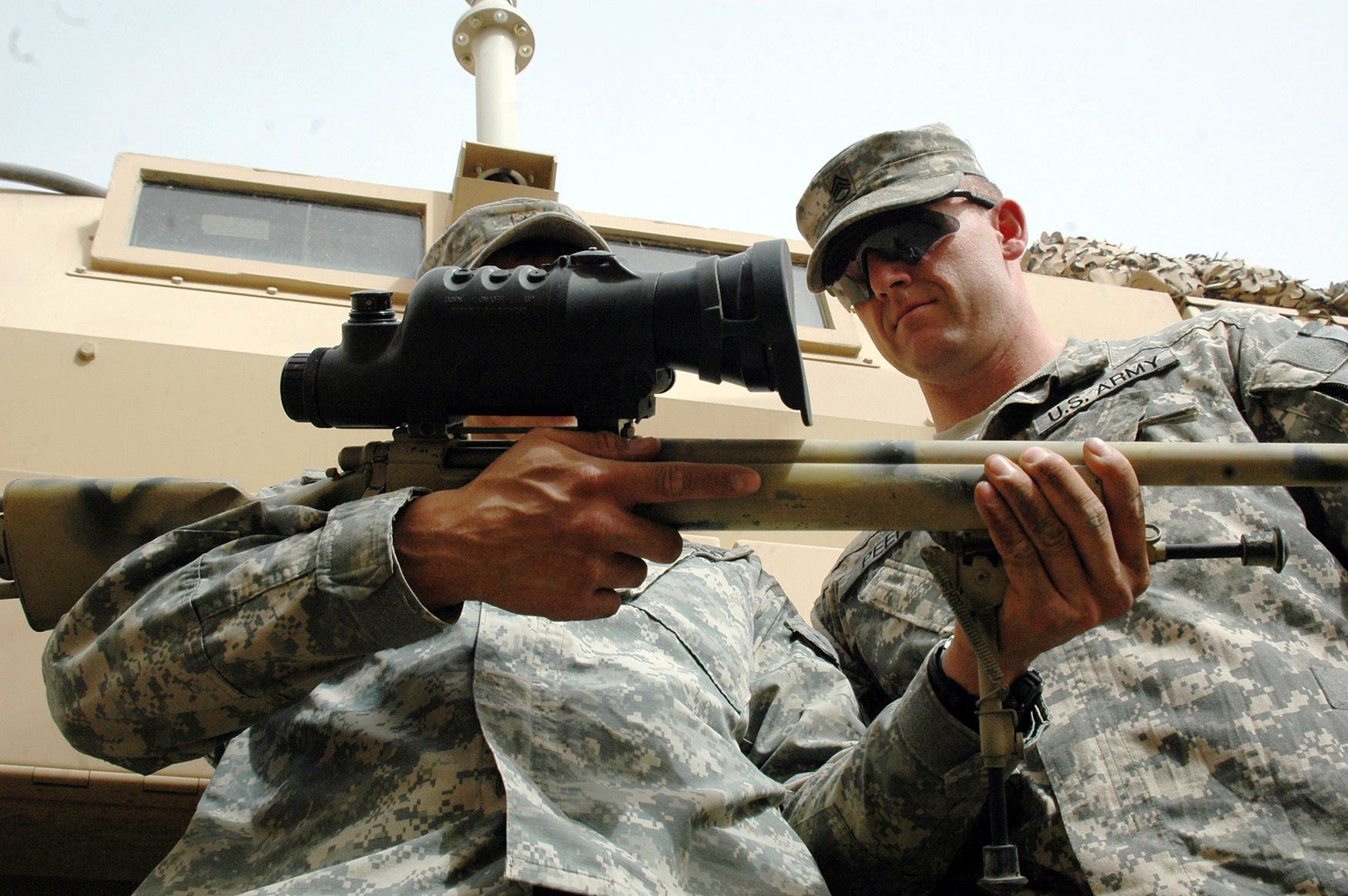 Army Sgt. Murray Spence (left), an infantry scout sniper originally ...