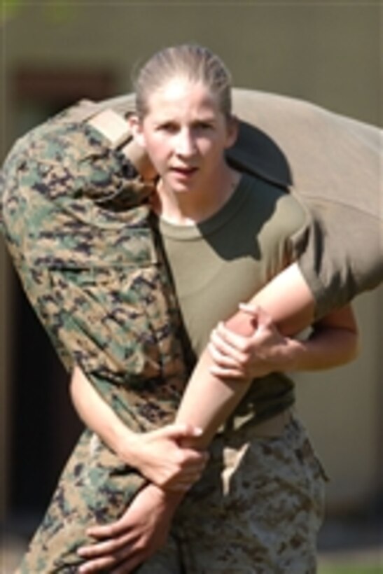 Cpl. Jennifer Eagelman performs the fireman's carry. | U.S. Department ...