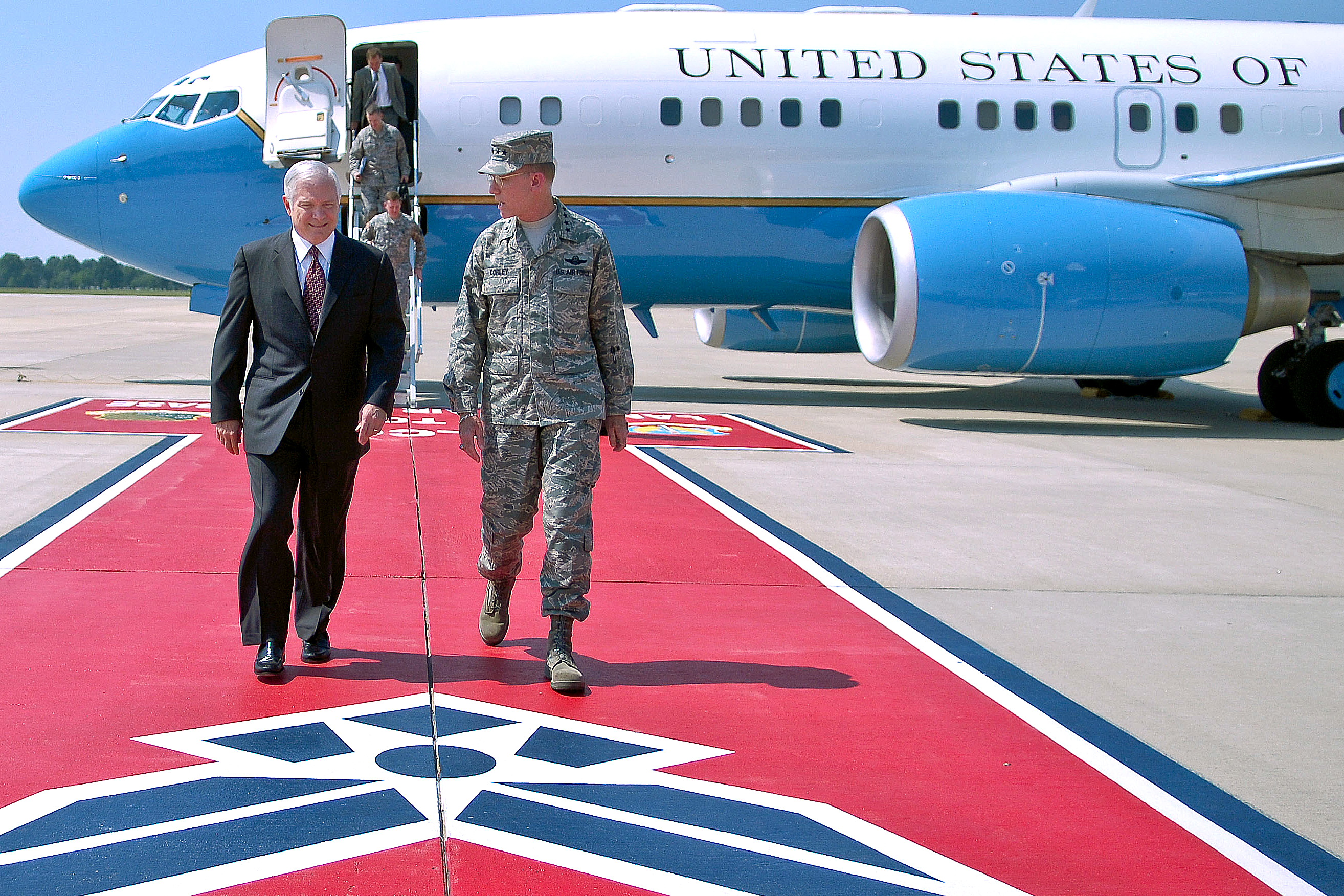 U.S. Defense Secretary Robert M. Gates is greeted by Gen. John D.W ...