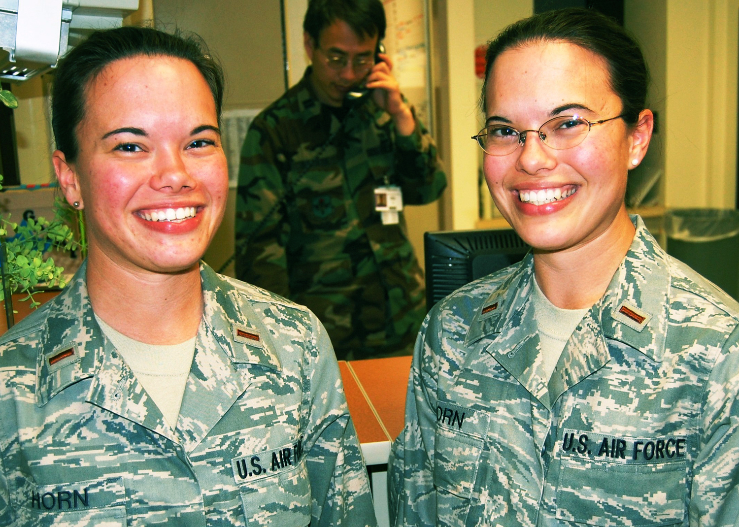 Identical twins finish nurse transition program