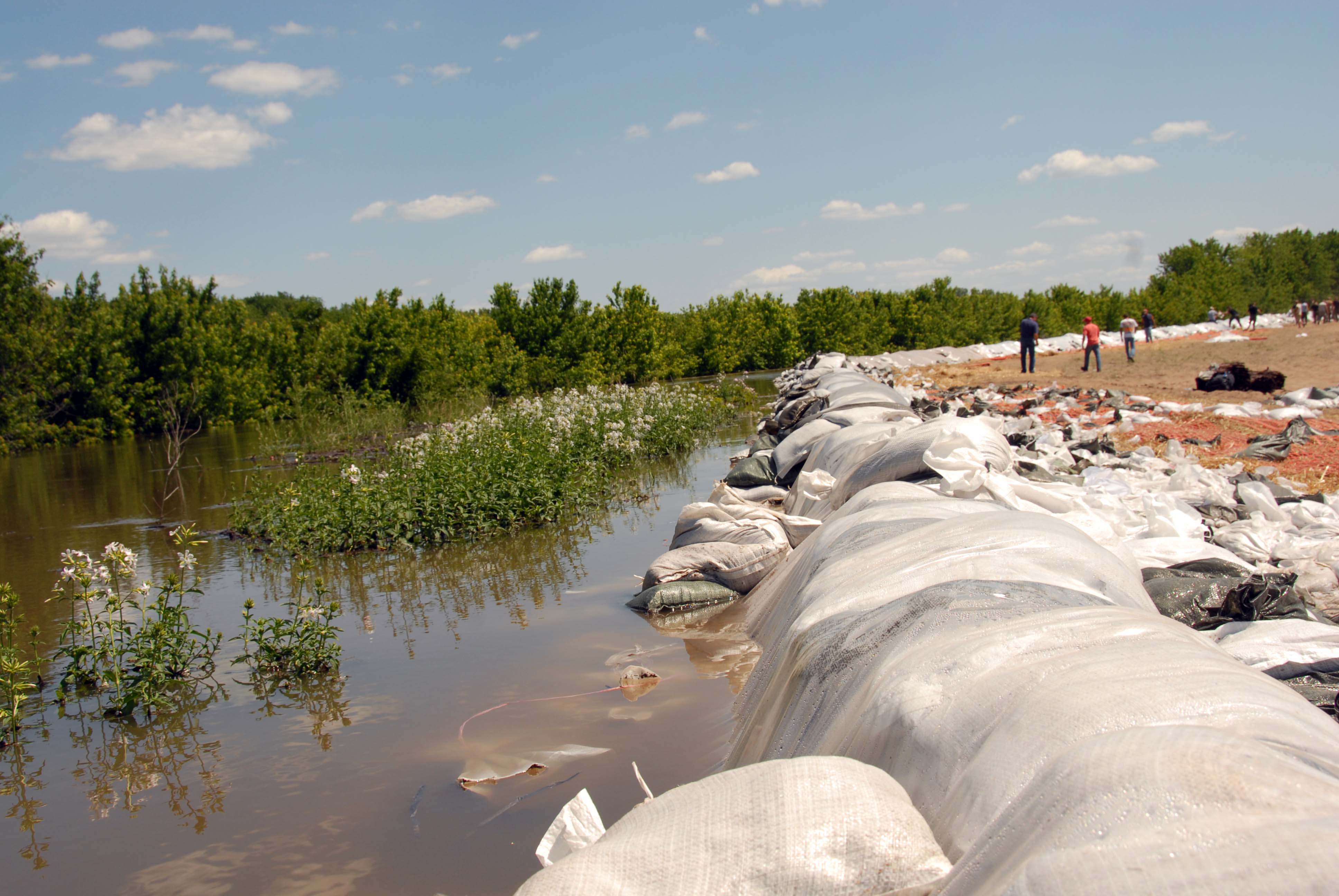 Flood waters inch up on the levee