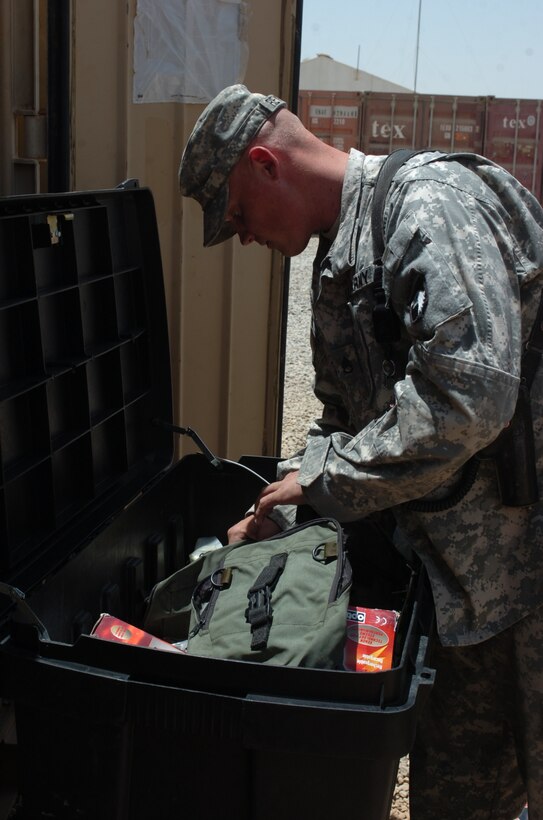 Army Staff Sgt. Jeremy Reynolds, a native of Arlington, Texas, looks ...